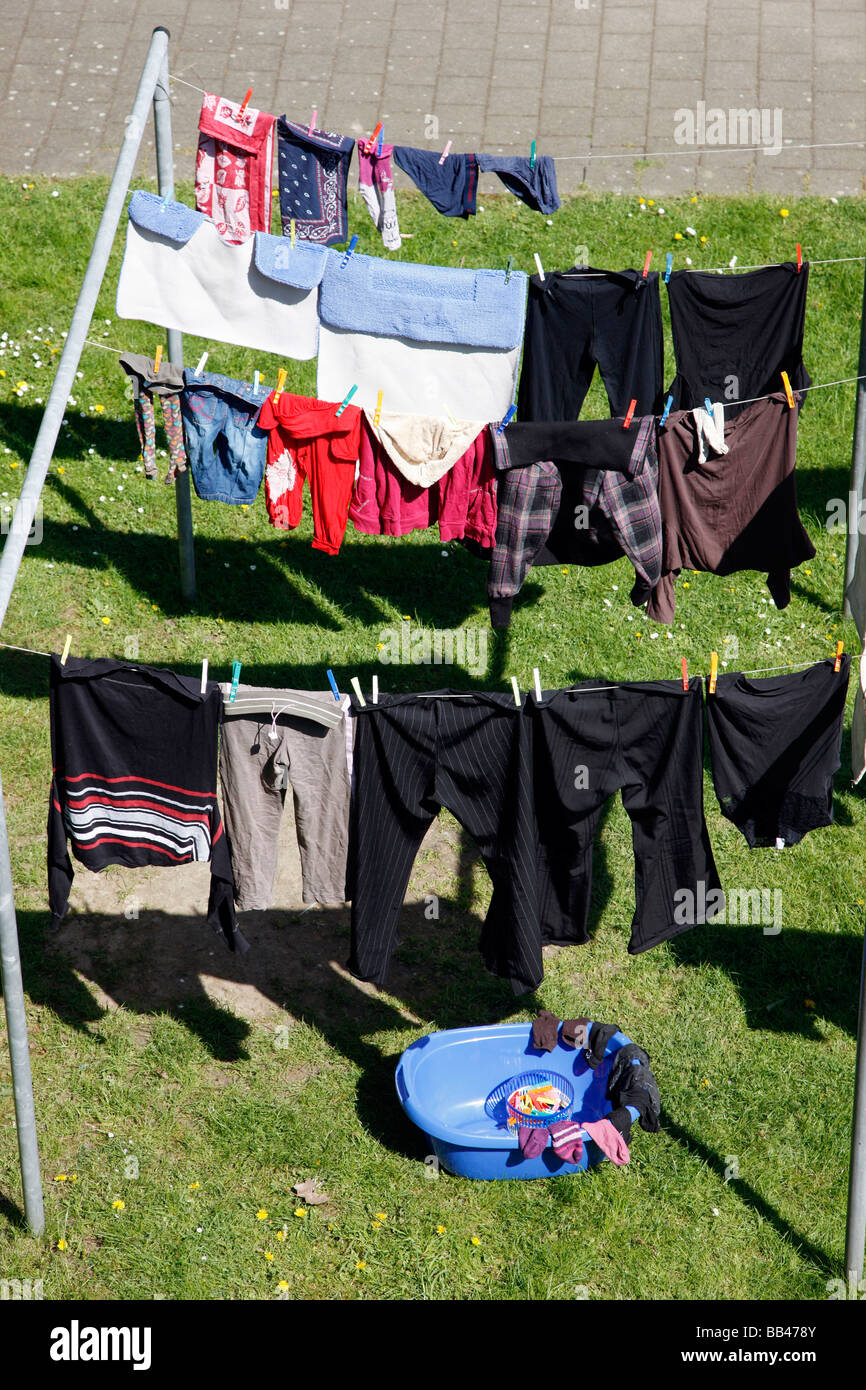Hanging out the laundry for drying in a garden, Gelsenkirchen, Germany ...
