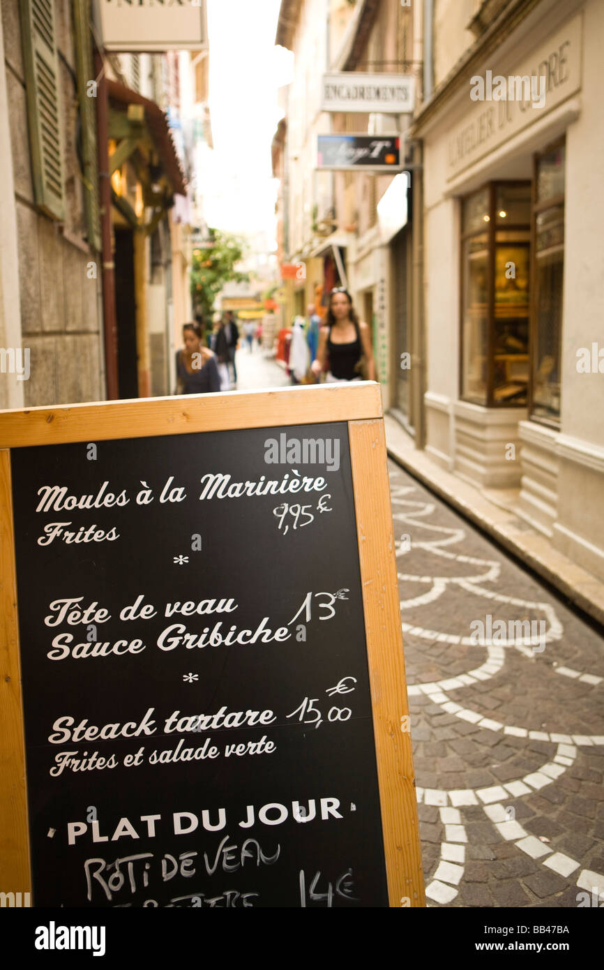 Menu sign on colorful street area of Antibes, France Stock Photo - Alamy