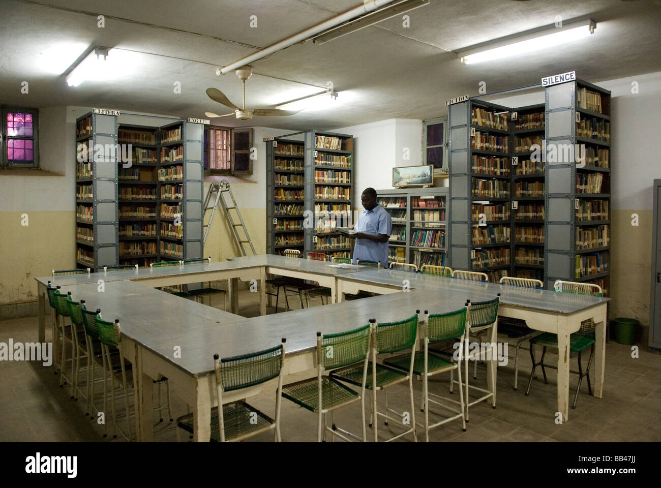Librarian in a reading room on the library in Comboni college Khartoum ...