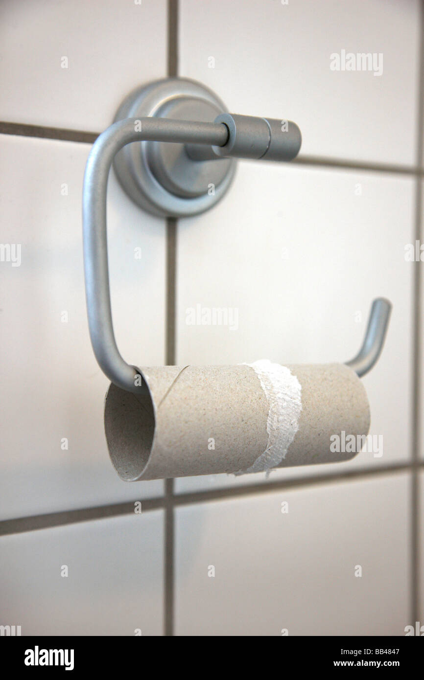 Empty toilet roll in a bath room Stock Photo - Alamy
