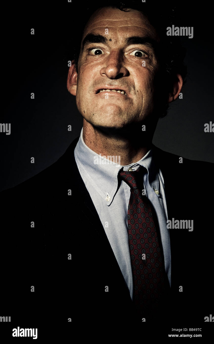 Low angle, close up, head and shoulders view of a mature man in a ...