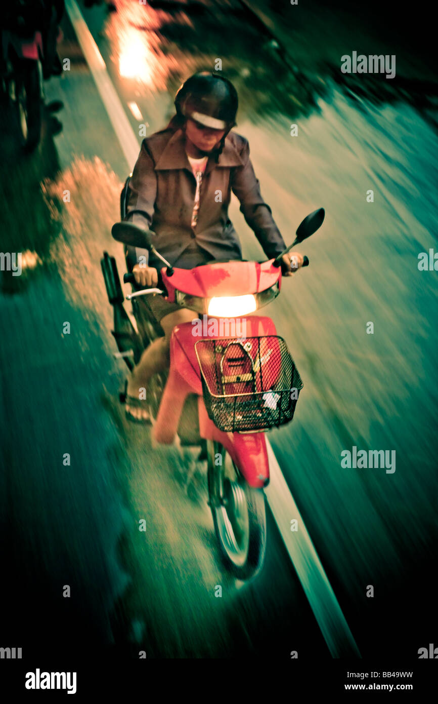 Bangkok moped rain hi-res stock photography and images - Alamy
