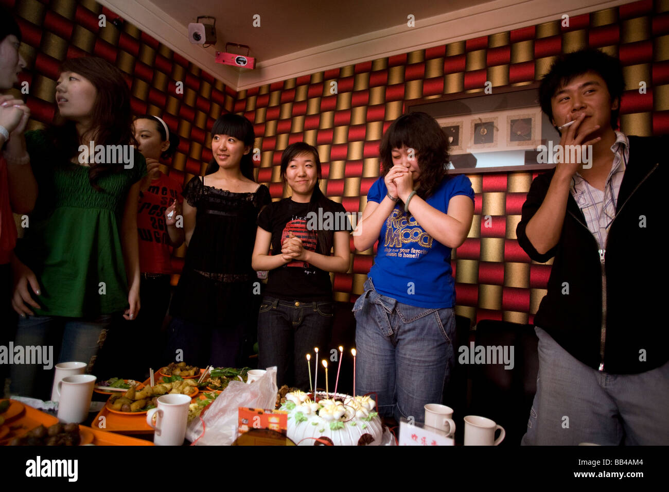 Young people at a birthday party in Beijing, China Stock Photo - Alamy