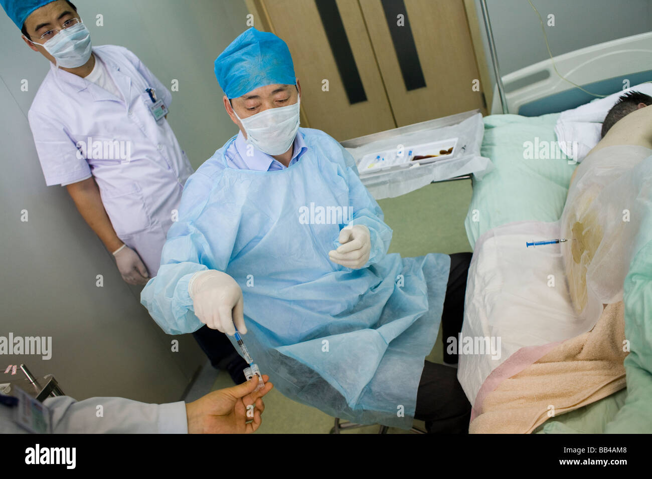 A patient gets an injection of stem cells in Qingdao, China Stock Photo ...