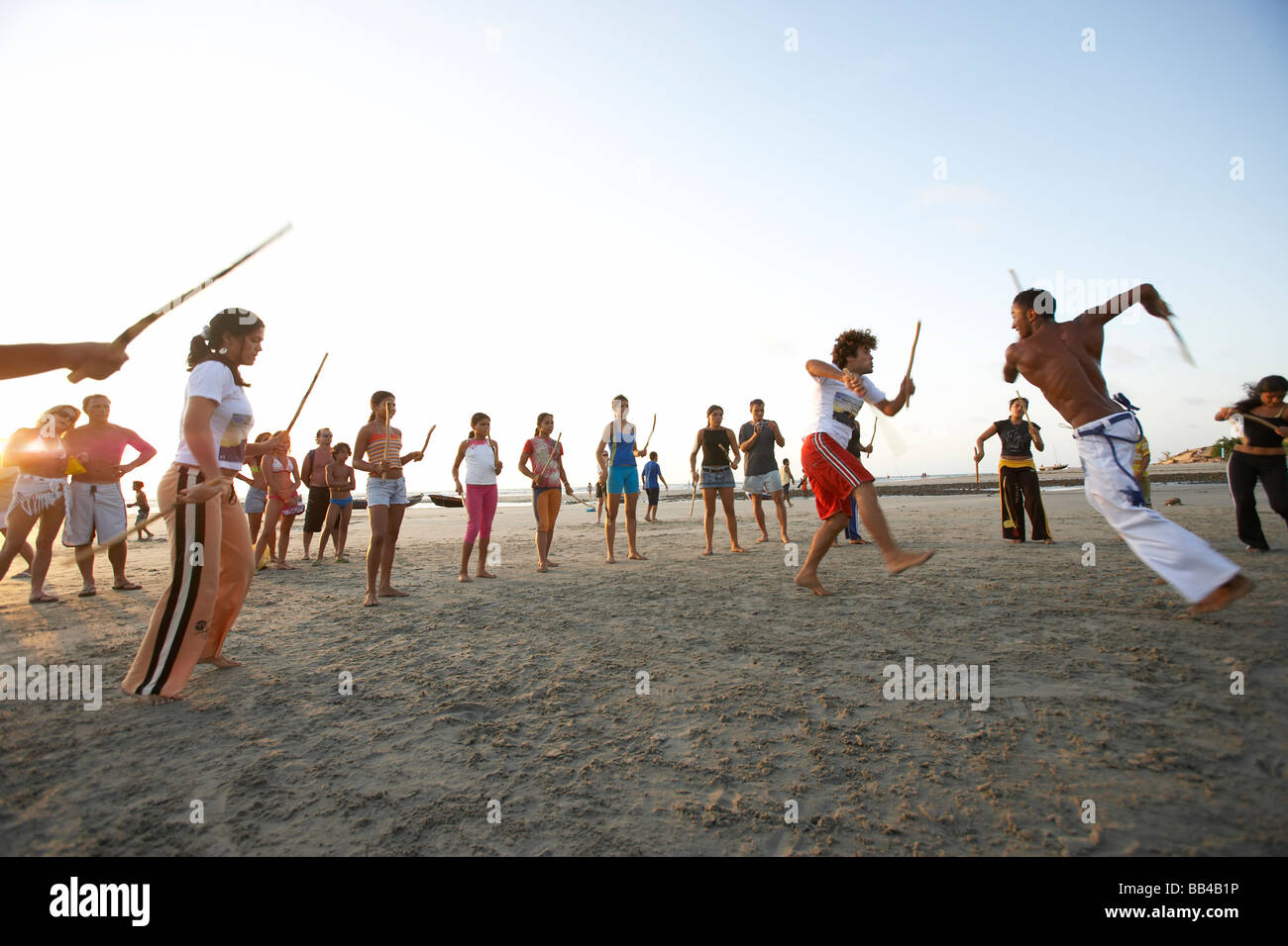 students practicing a form of Capoeira on the beach, Jericoacoara ...