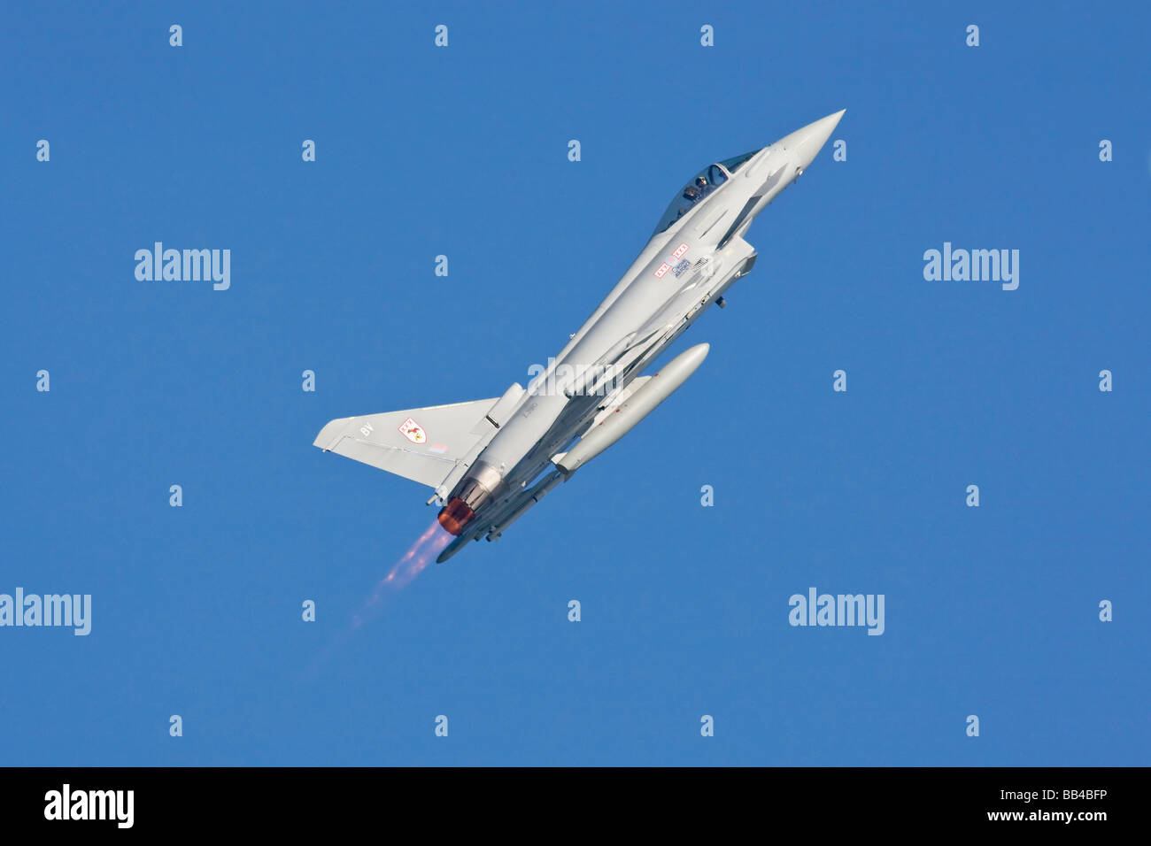 An RAF Bae systems Typhoon fighter on a reheat climb out Stock Photo ...