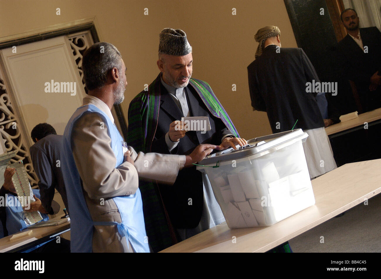 Afghan President Hamid Karzai casts his vote Stock Photo - Alamy