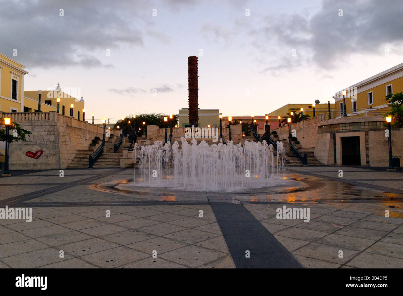 Low Angle View of a Fountain on a Square at Dusk Quincentennial Square ...