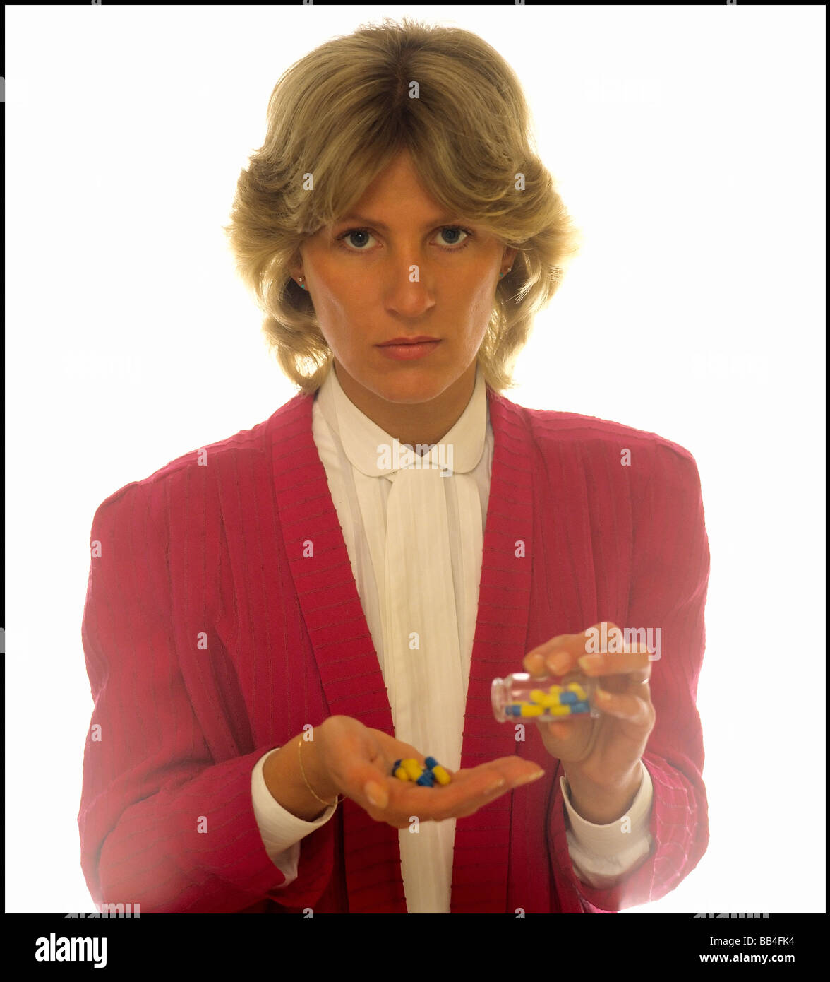 YOUNG WOMAN TAKING CAPSULES Stock Photo - Alamy