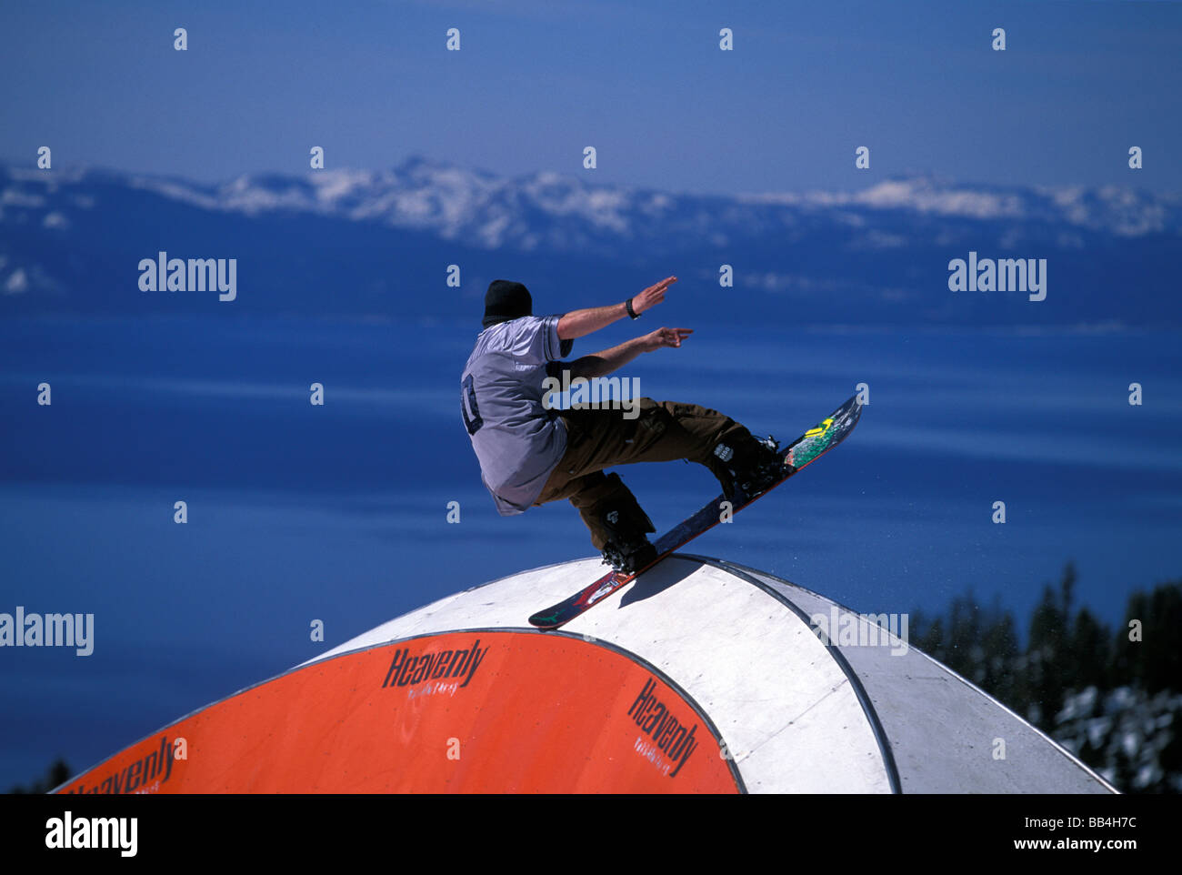 Snowboarder grinding rail hi-res stock photography and images - Alamy