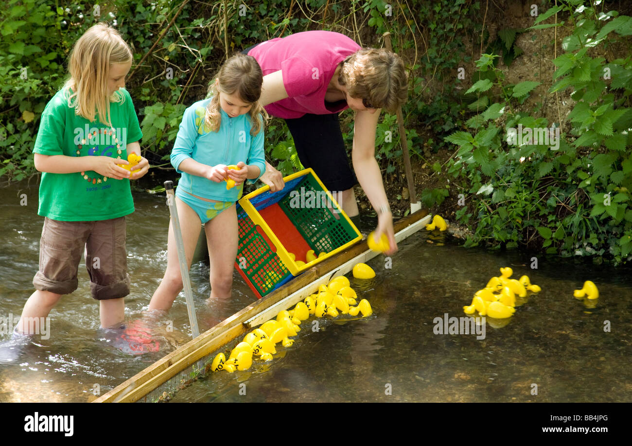 The winners are collected at the finish line in a Charity plastic duck ...