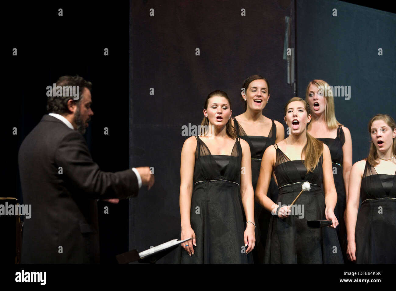 Female choir conductor hi-res stock photography and images - Alamy