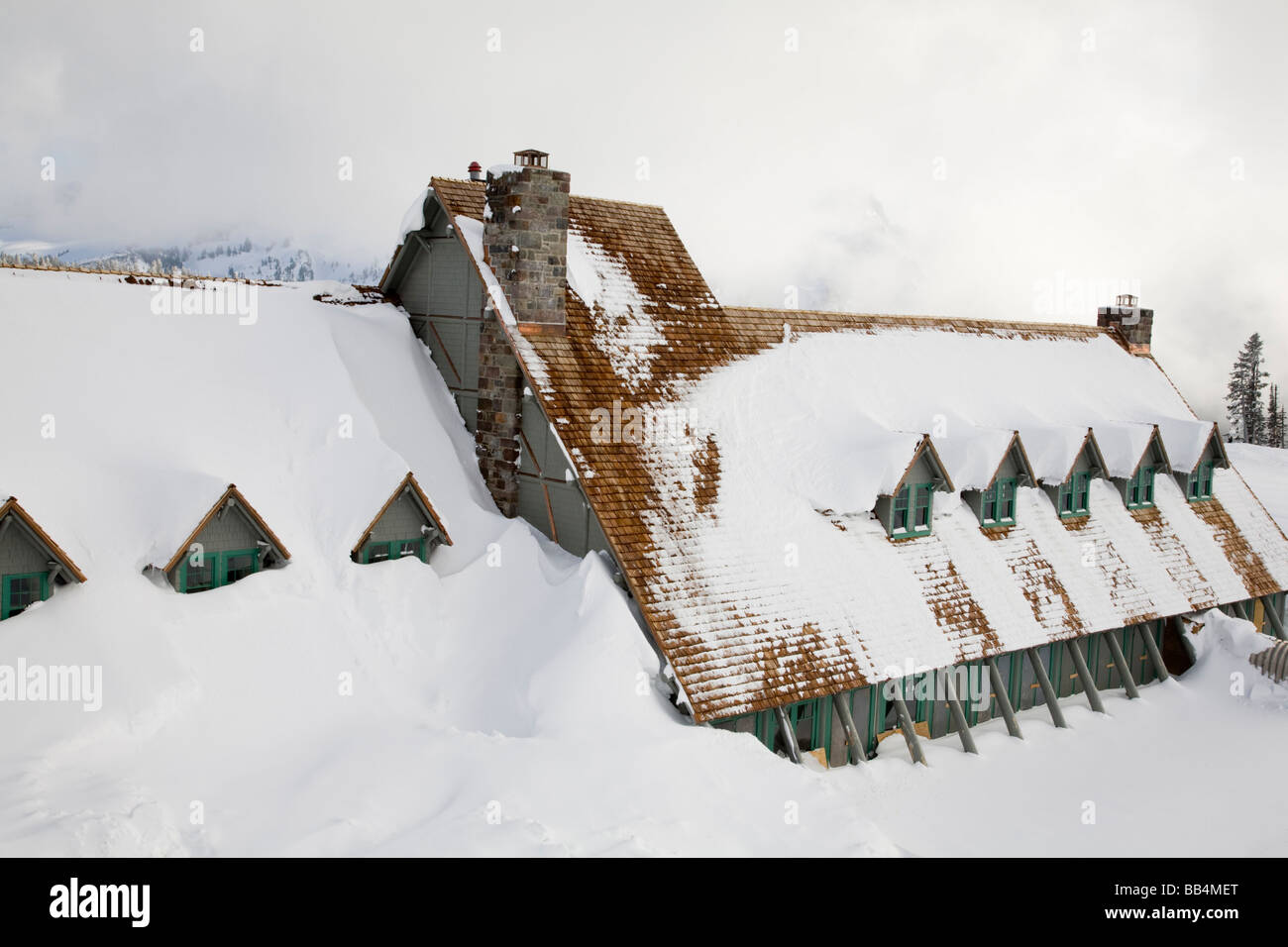 WA, Mount Rainier National Park, Paradise Inn, covered in snow Stock ...