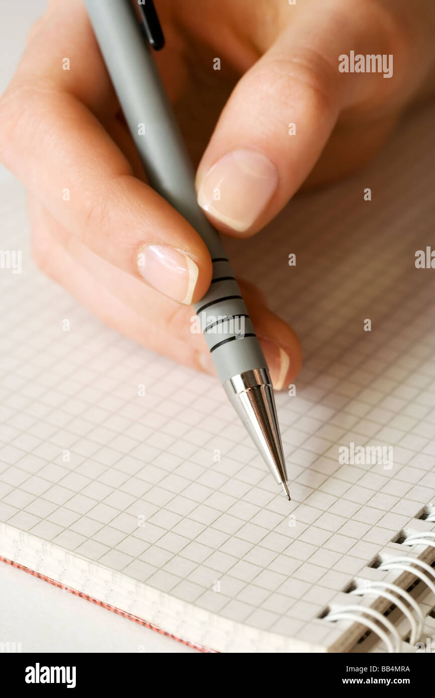 Female hand writing Stock Photo - Alamy