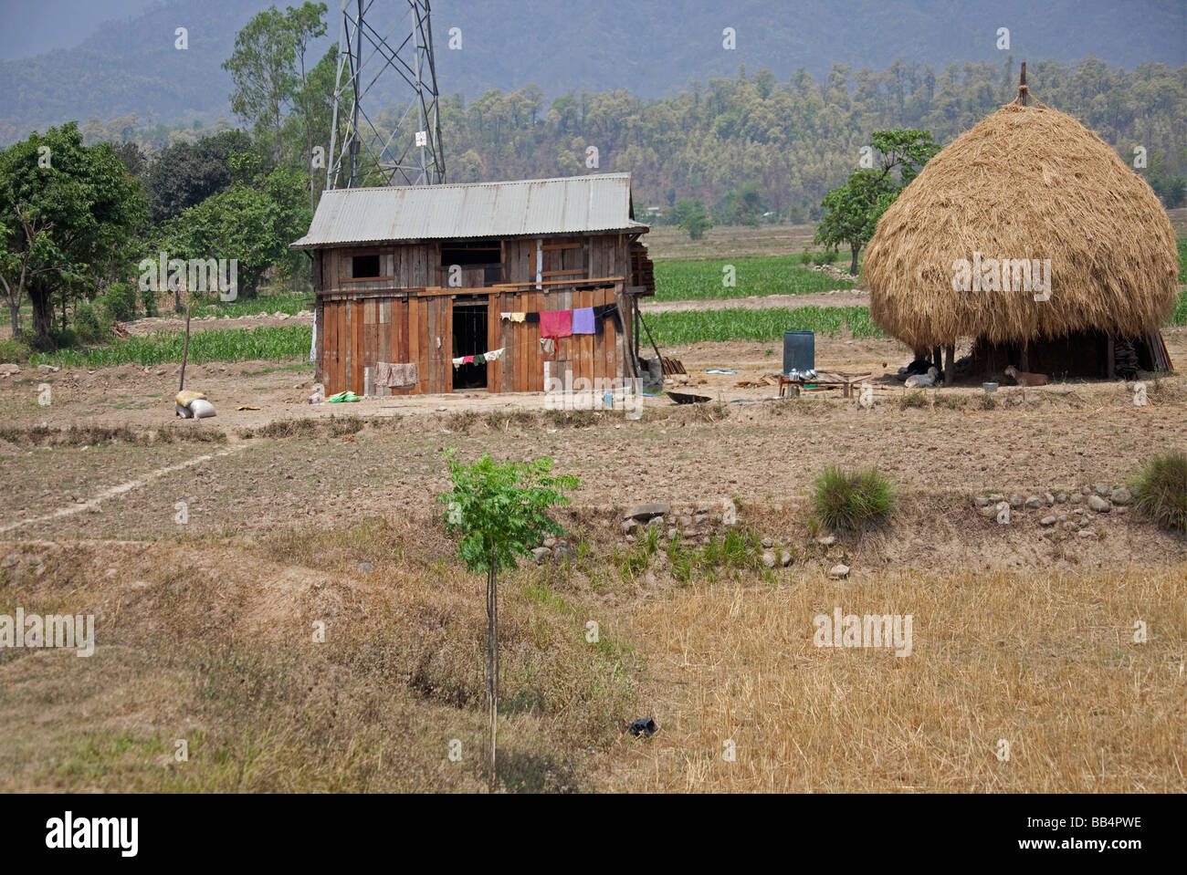 Old farm barn and Hay stack in remote village Chitwan National Park ...