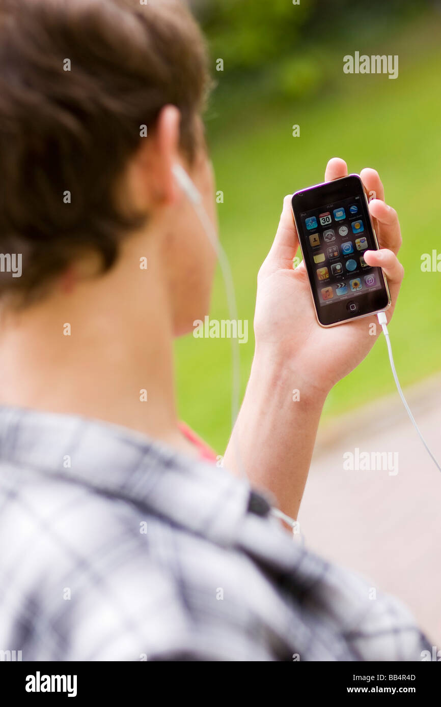 Man listening to iPod Stock Photo - Alamy