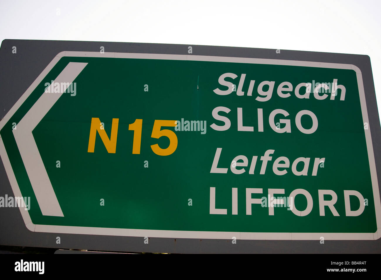 Europe, Ireland, Donegal. Directional sign in English and Gaelic Stock ...
