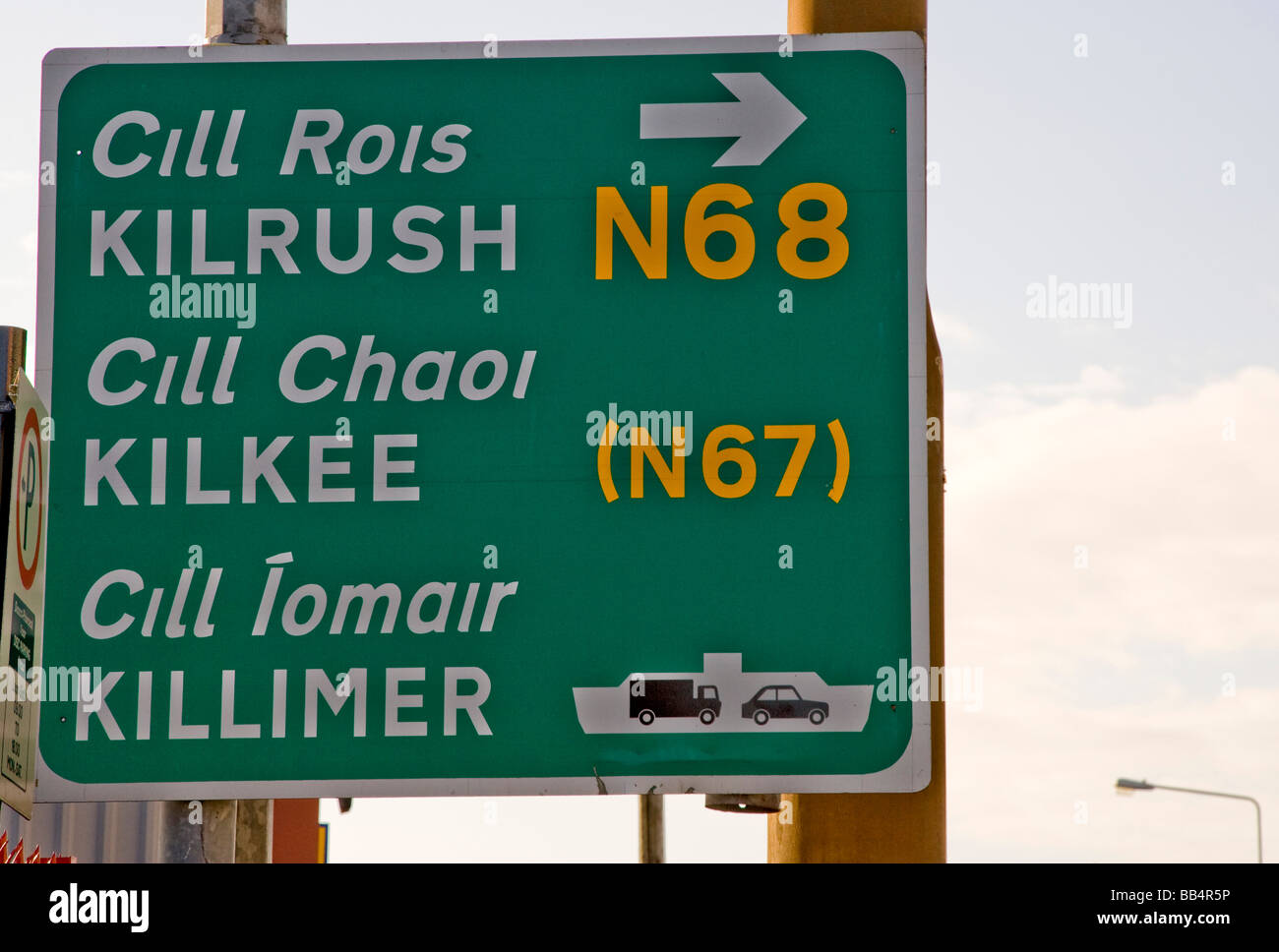 Europe, Ireland, Donegal. Directional sign in English and Gaelic Stock ...