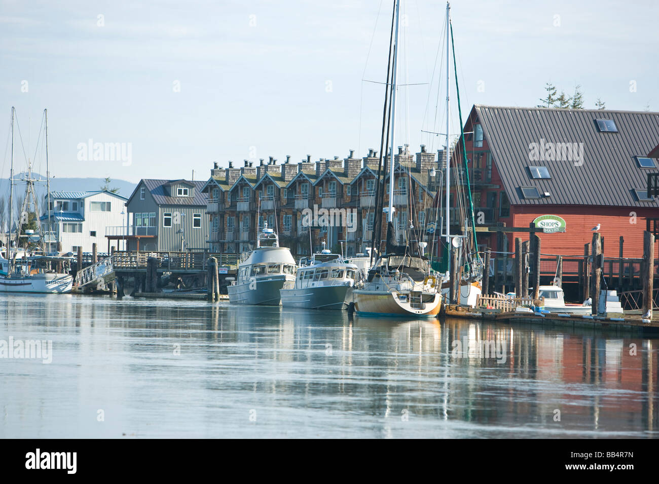USA, Washington State, La Conner. Sailboats at the docks Stock Photo ...