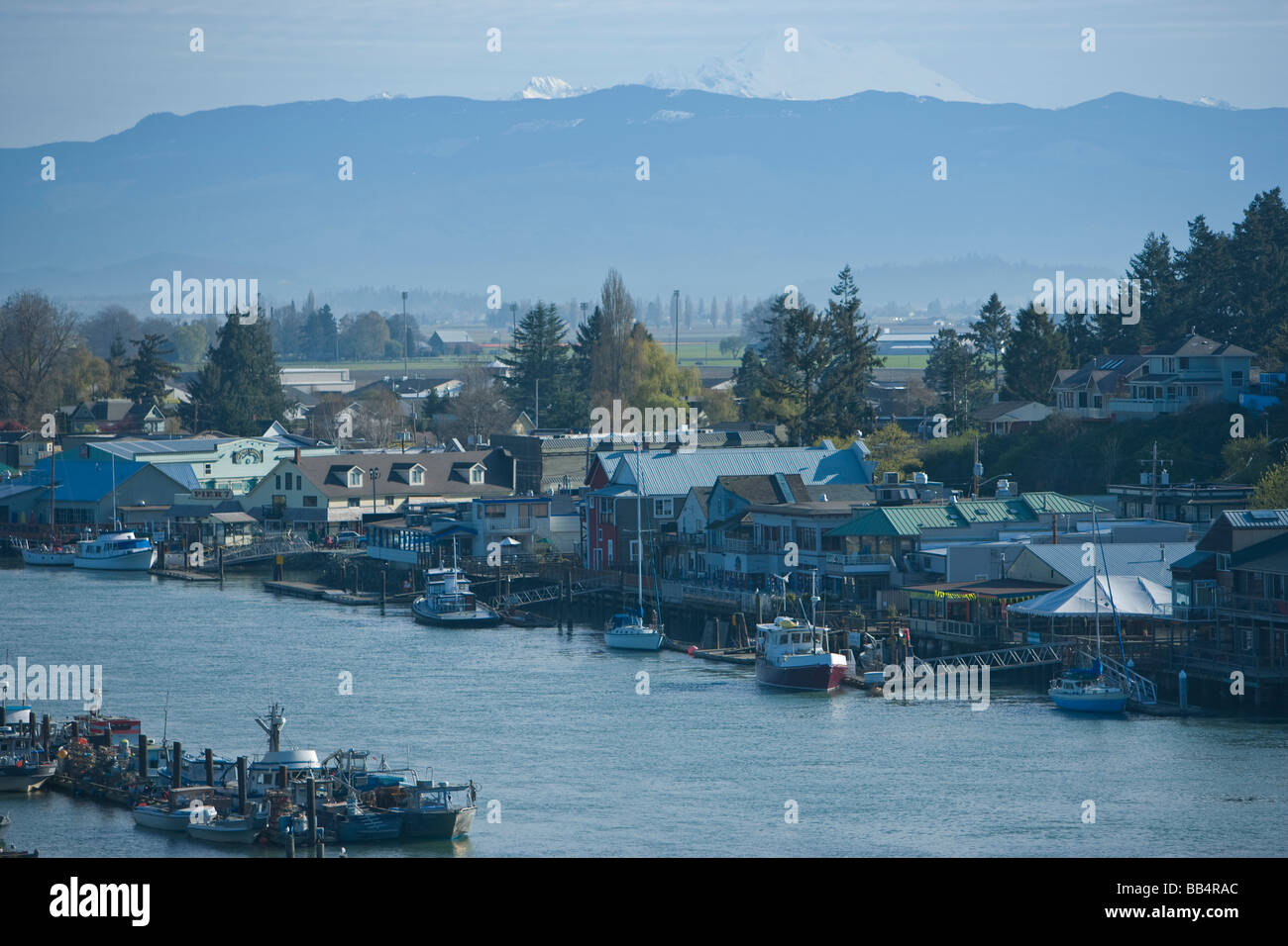 USA, Washington State, La Conner. View of La Conner and the Cascades ...