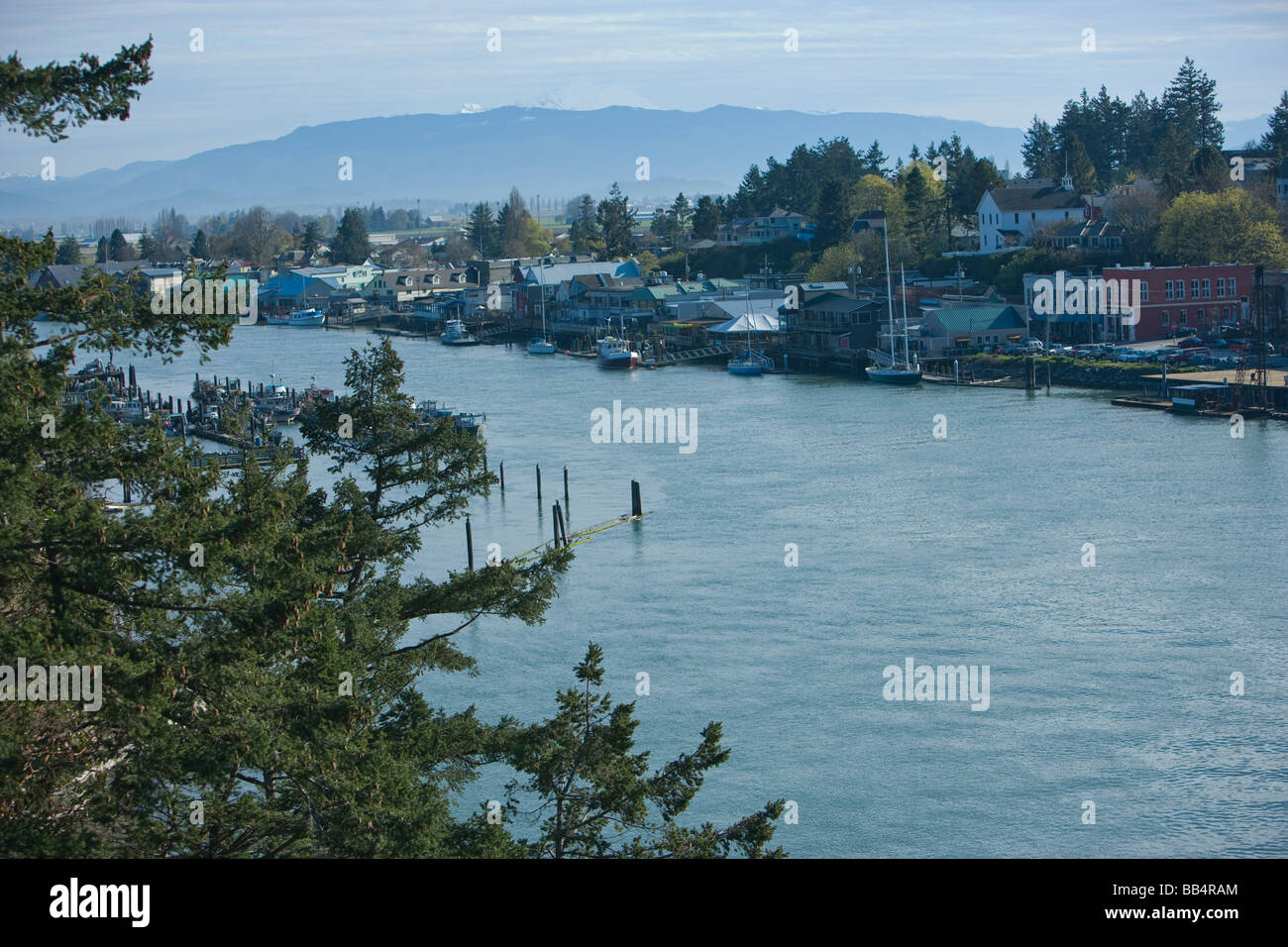 USA, Washington State, La Conner. View of La Conner and the Cascades ...