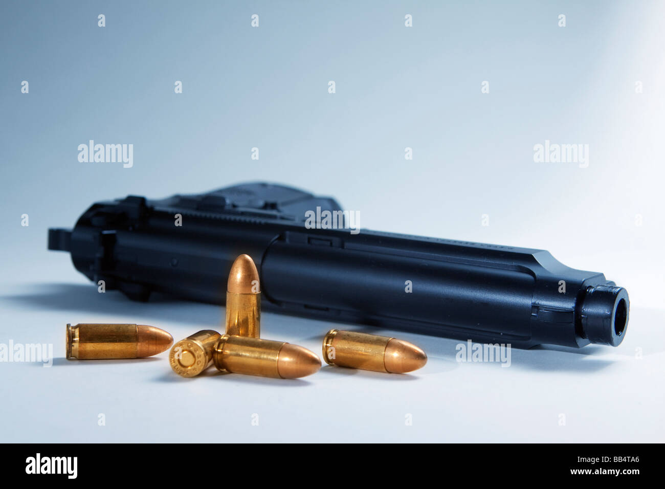 pistol and bullets Stock Photo - Alamy