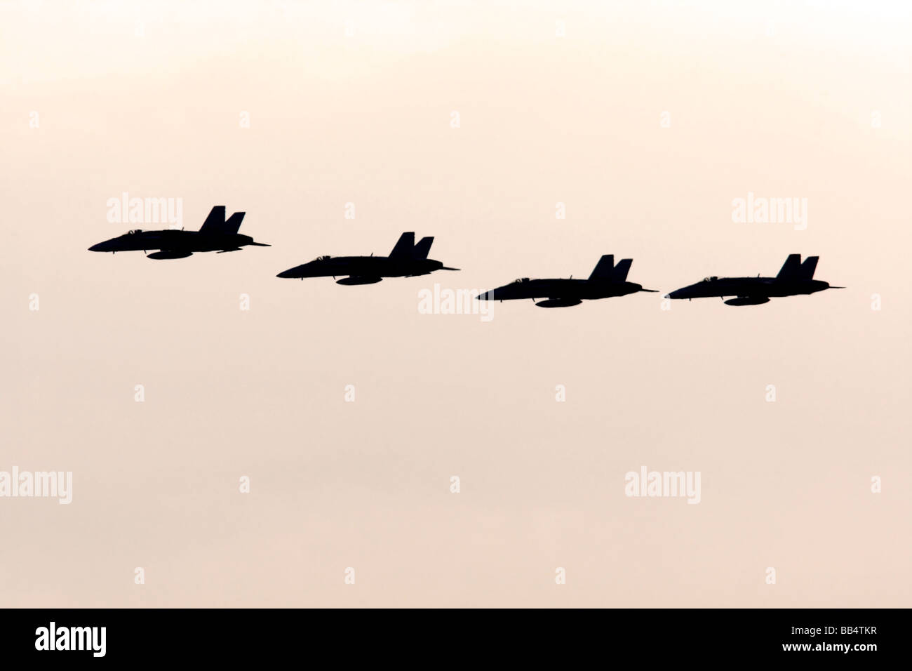 A Single Line Formation of 4 F/ A-18 Hornet Jet Fighters Stock Photo ...