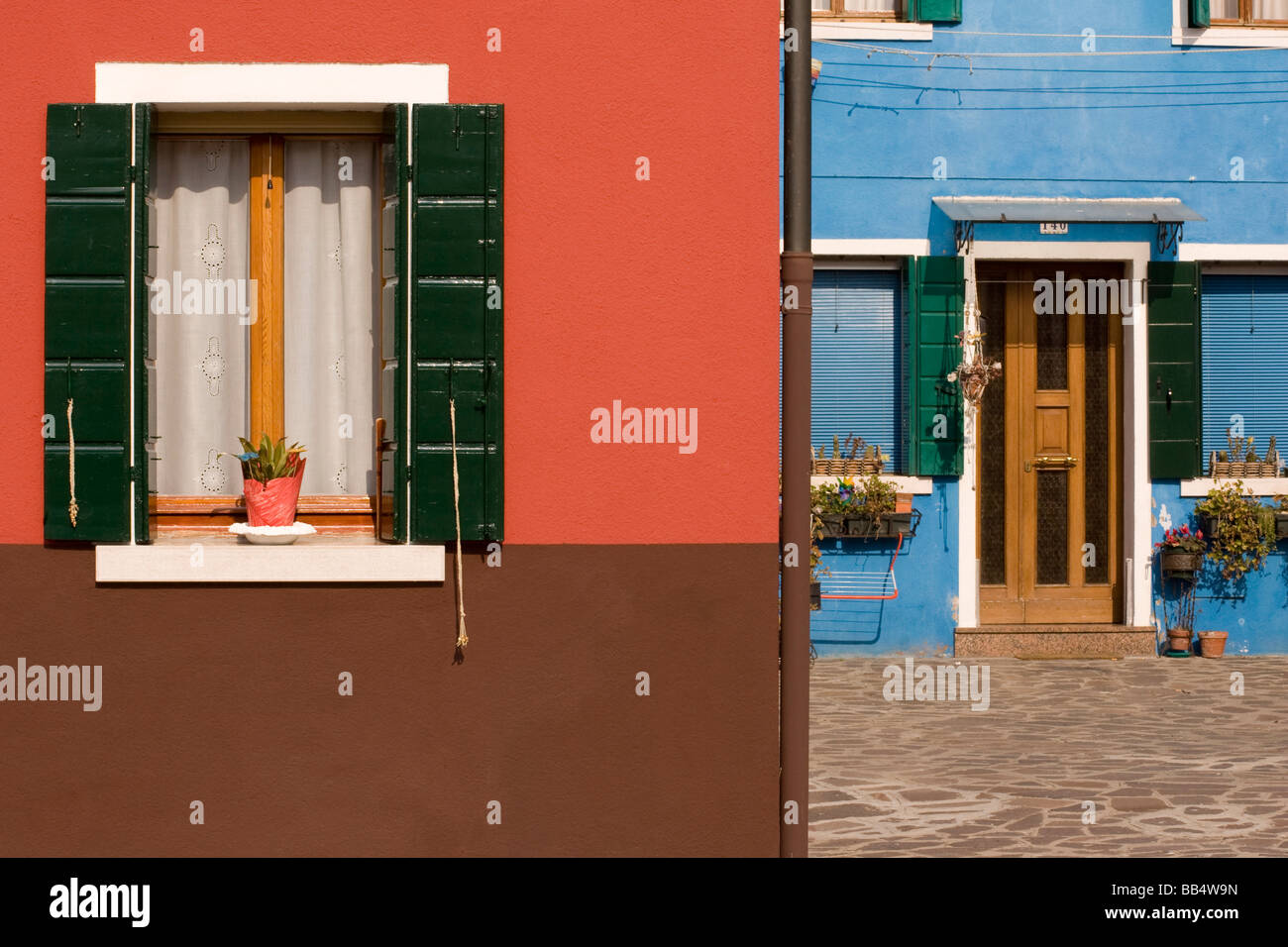 Italy, Venice, Burano. Contrast of colorful windows, door and walls Stock Photo - Alamy