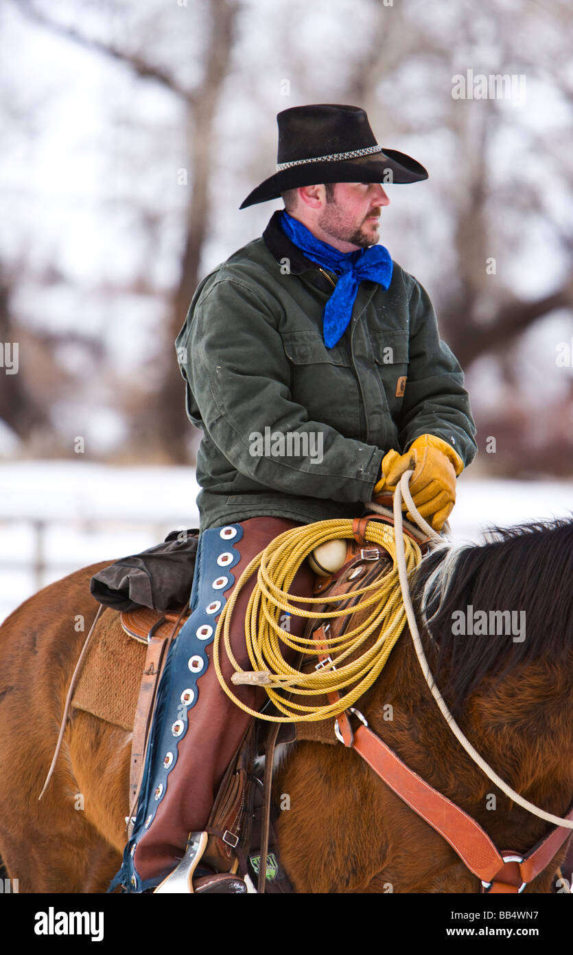 Cowboy riding a horse on the range on The Hideout Ranch in Shell ...