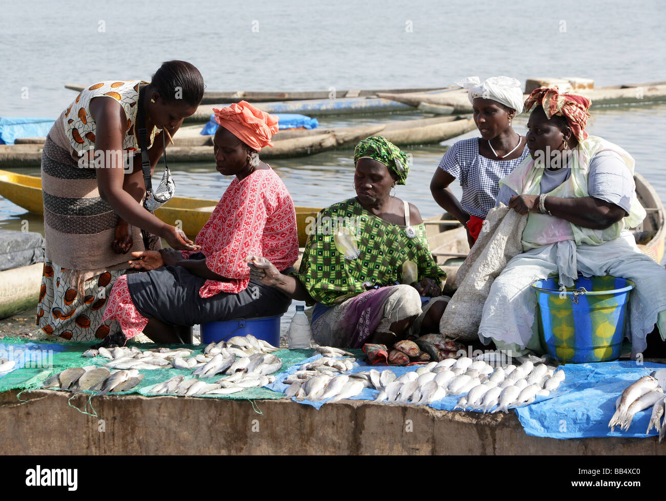 Senegal: women selling fish at the fish market in the harbour of ...