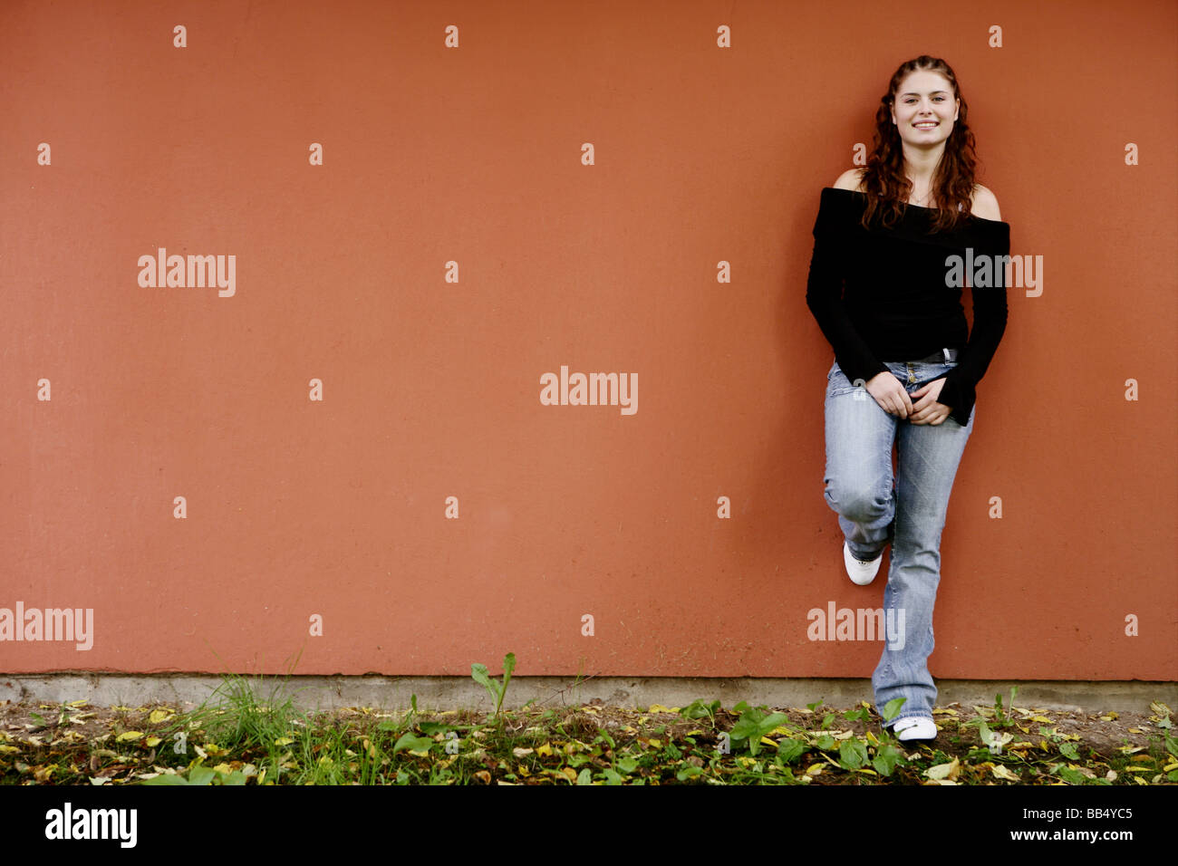 teenager female smiling standing Stock Photo - Alamy