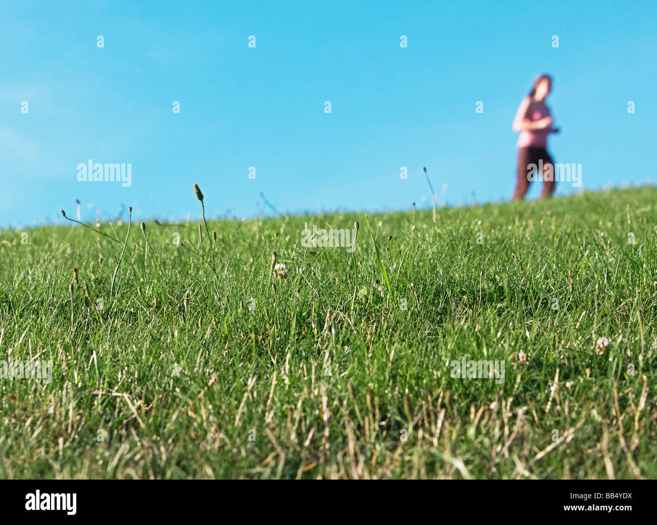 Running on hill hi-res stock photography and images - Alamy