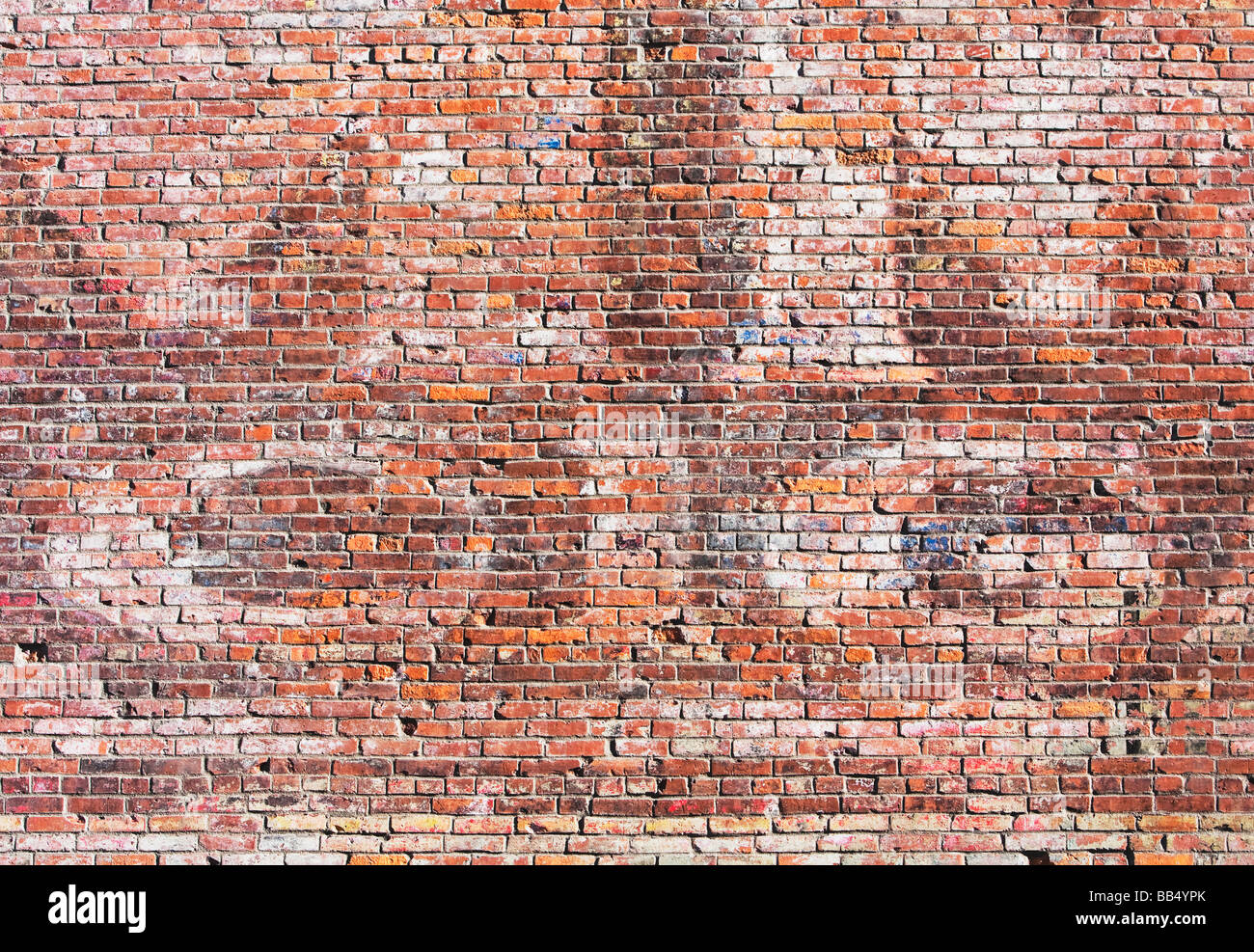 old brick wall with faded sign Stock Photo - Alamy
