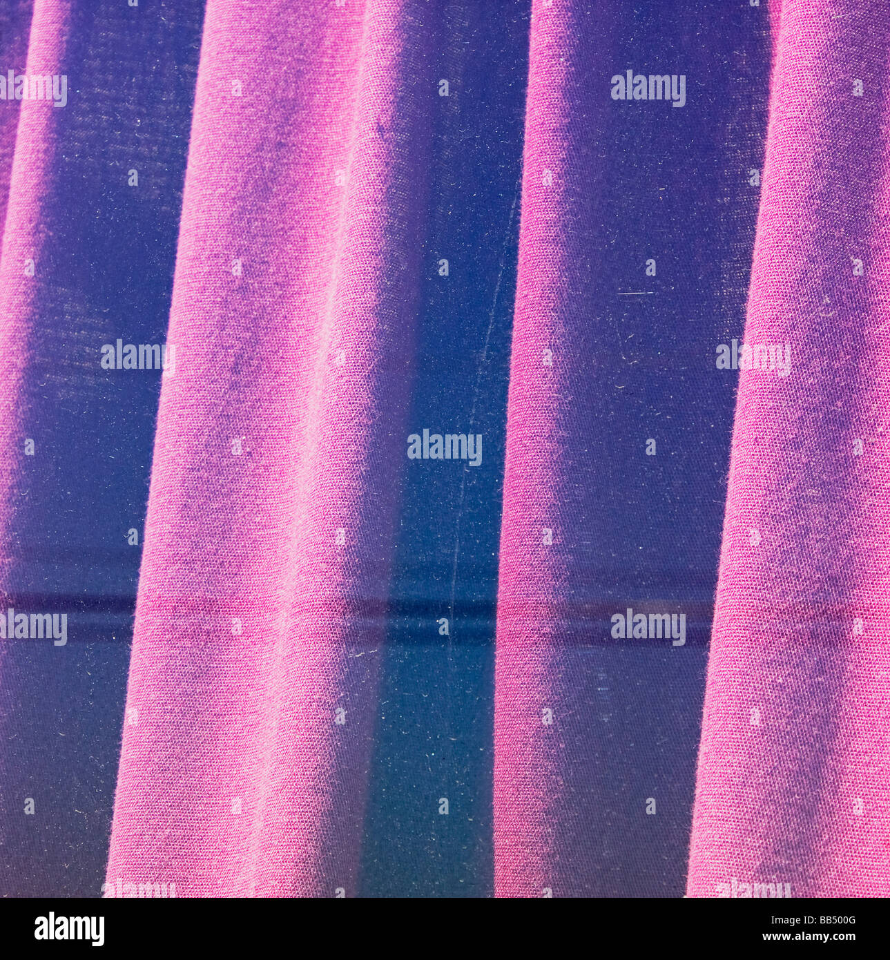 purple curtain seen through window Stock Photo - Alamy