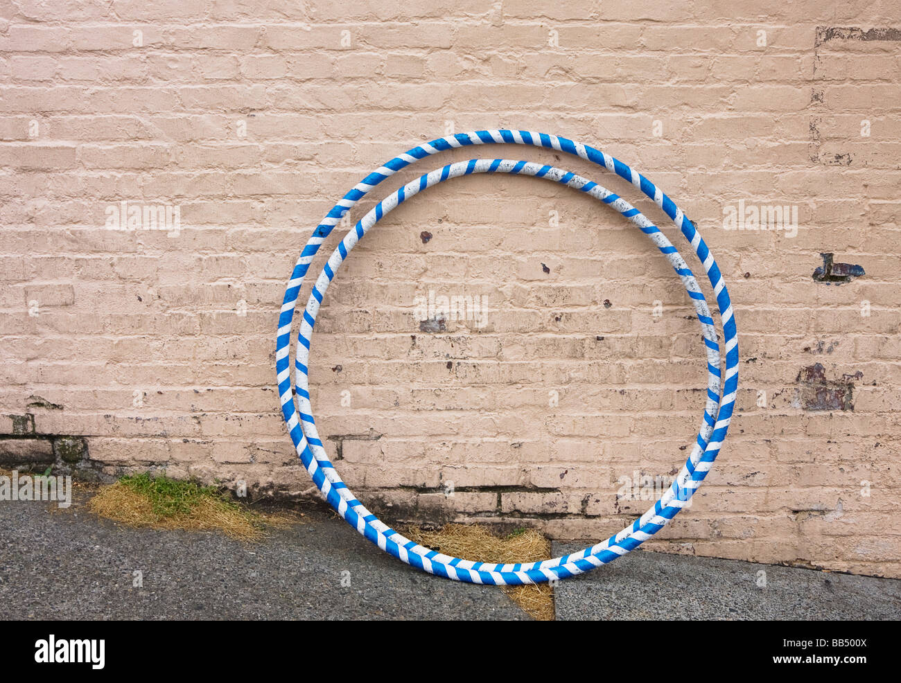 hula hoops against wall Stock Photo - Alamy