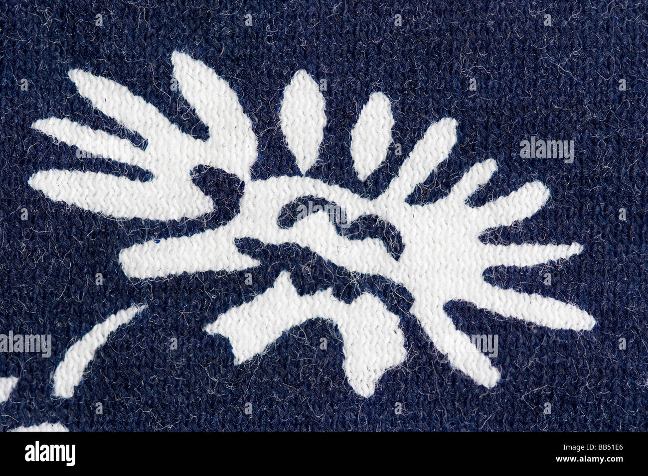 Single flower on fabric close up Stock Photo - Alamy