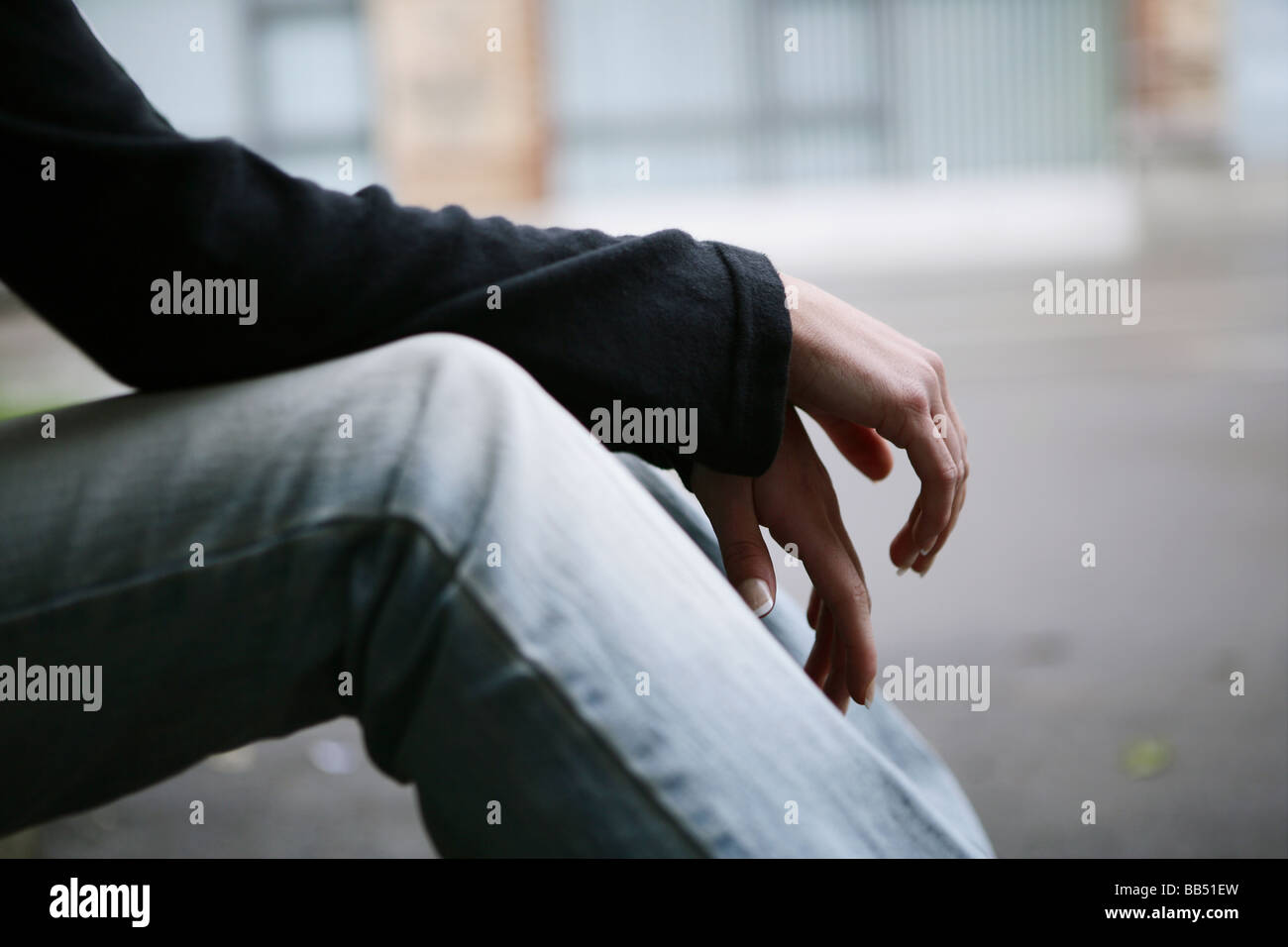 teenager female hands legs Stock Photo - Alamy