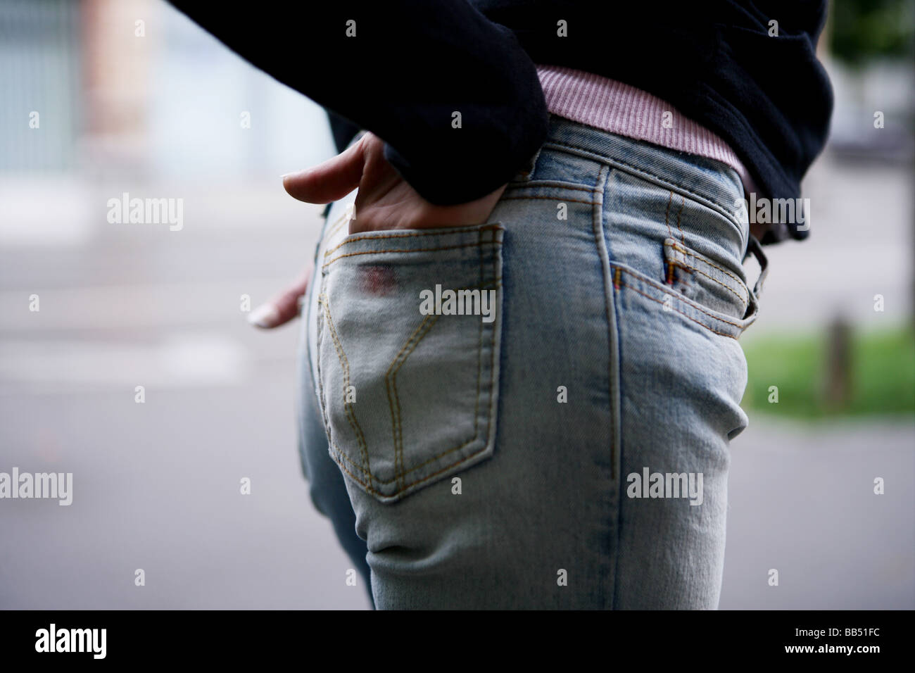 teenager female hands in jeans Stock Photo - Alamy