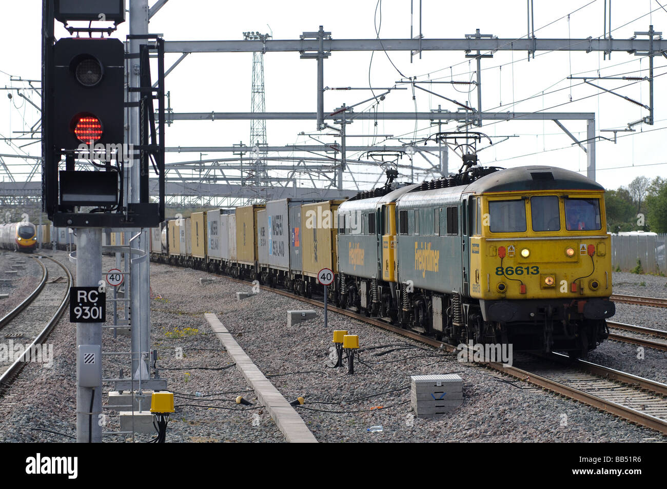 Electric locomotives pulling freightliner train at Rugby, England, UK ...