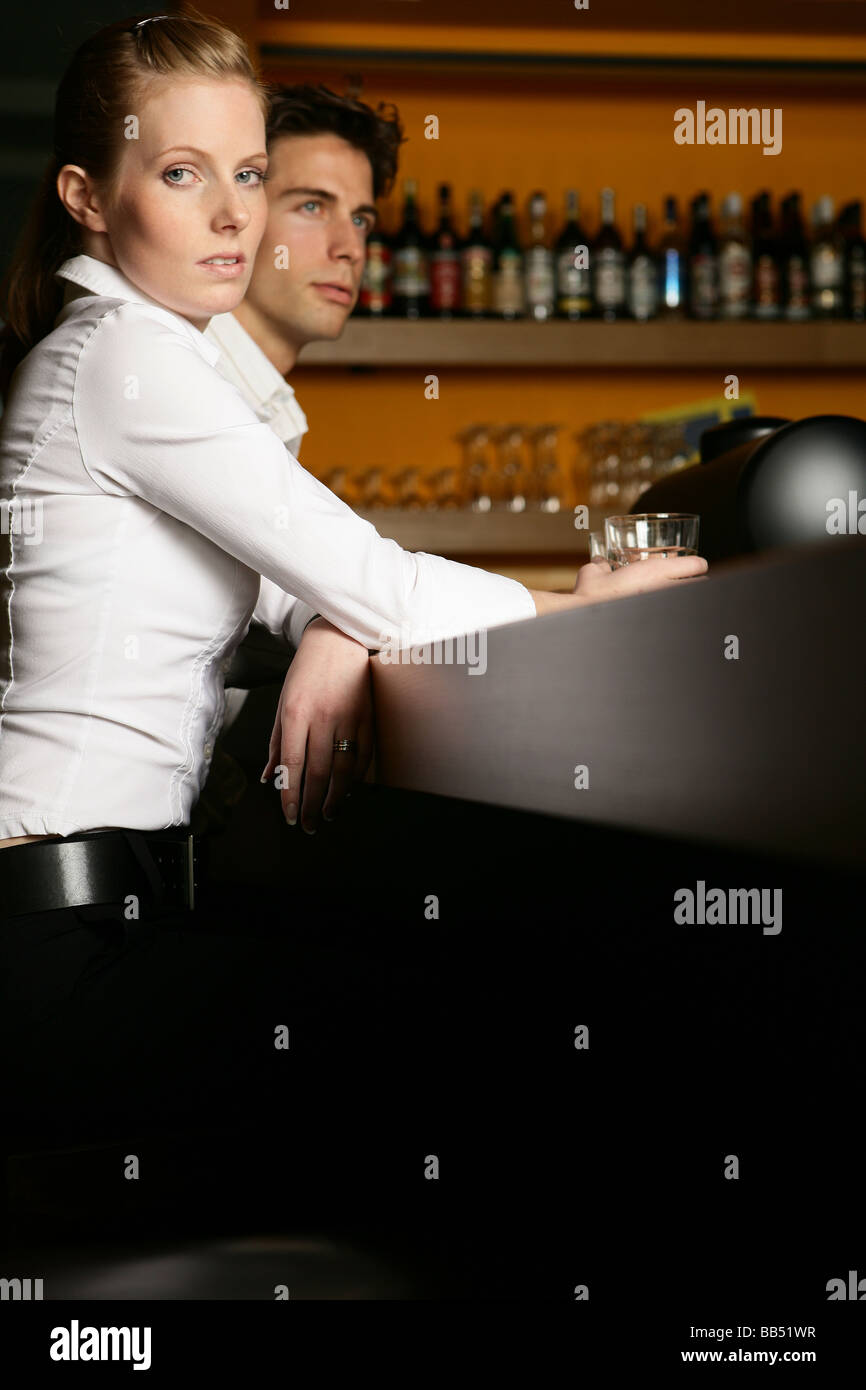 young couple are waiting in a bar Stock Photo - Alamy