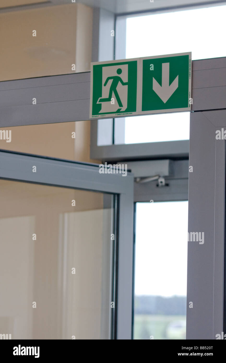 Sign - escape route Stock Photo - Alamy