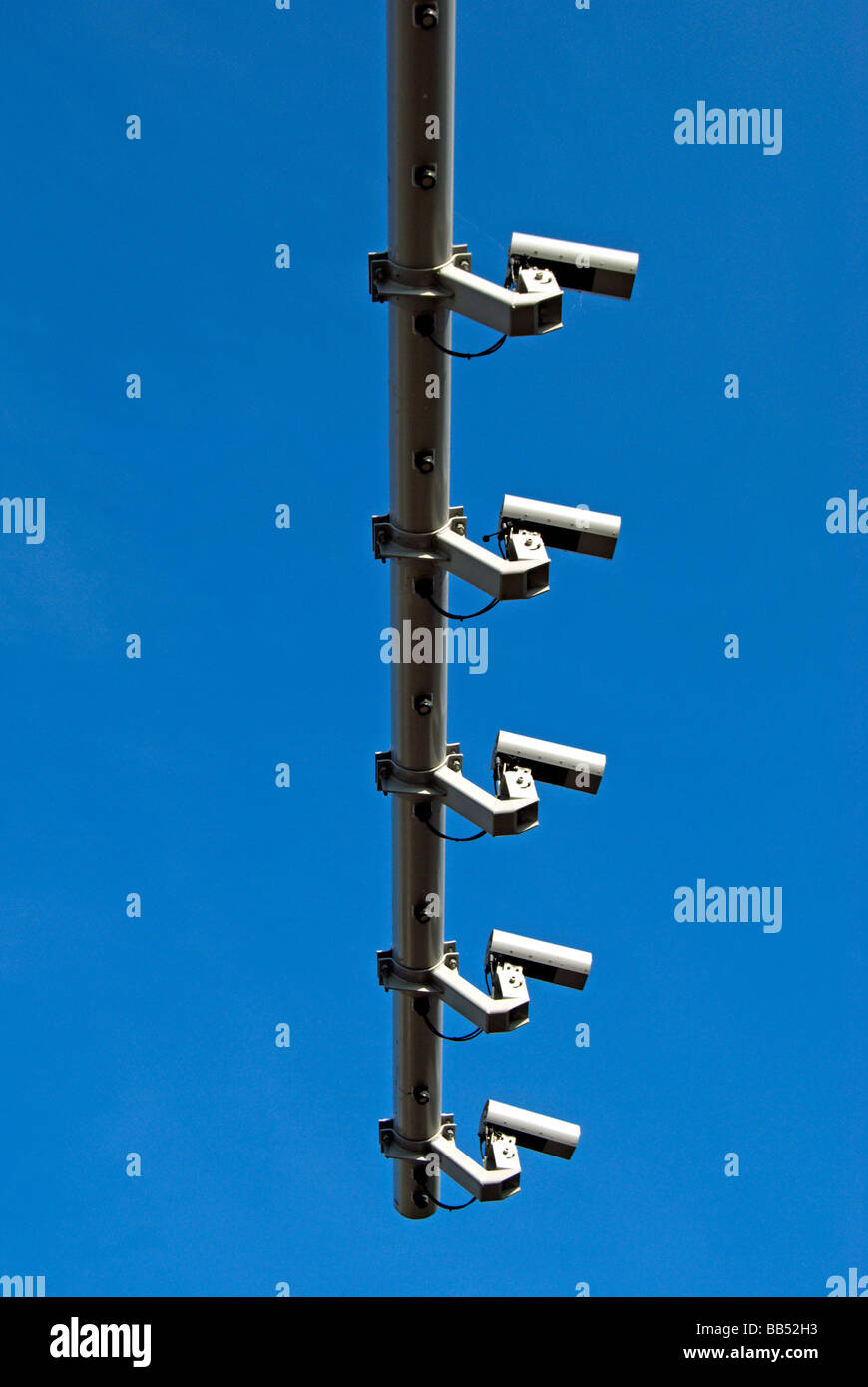 seen against a blue sky, a row of five cctv cameras above the A316 dual ...