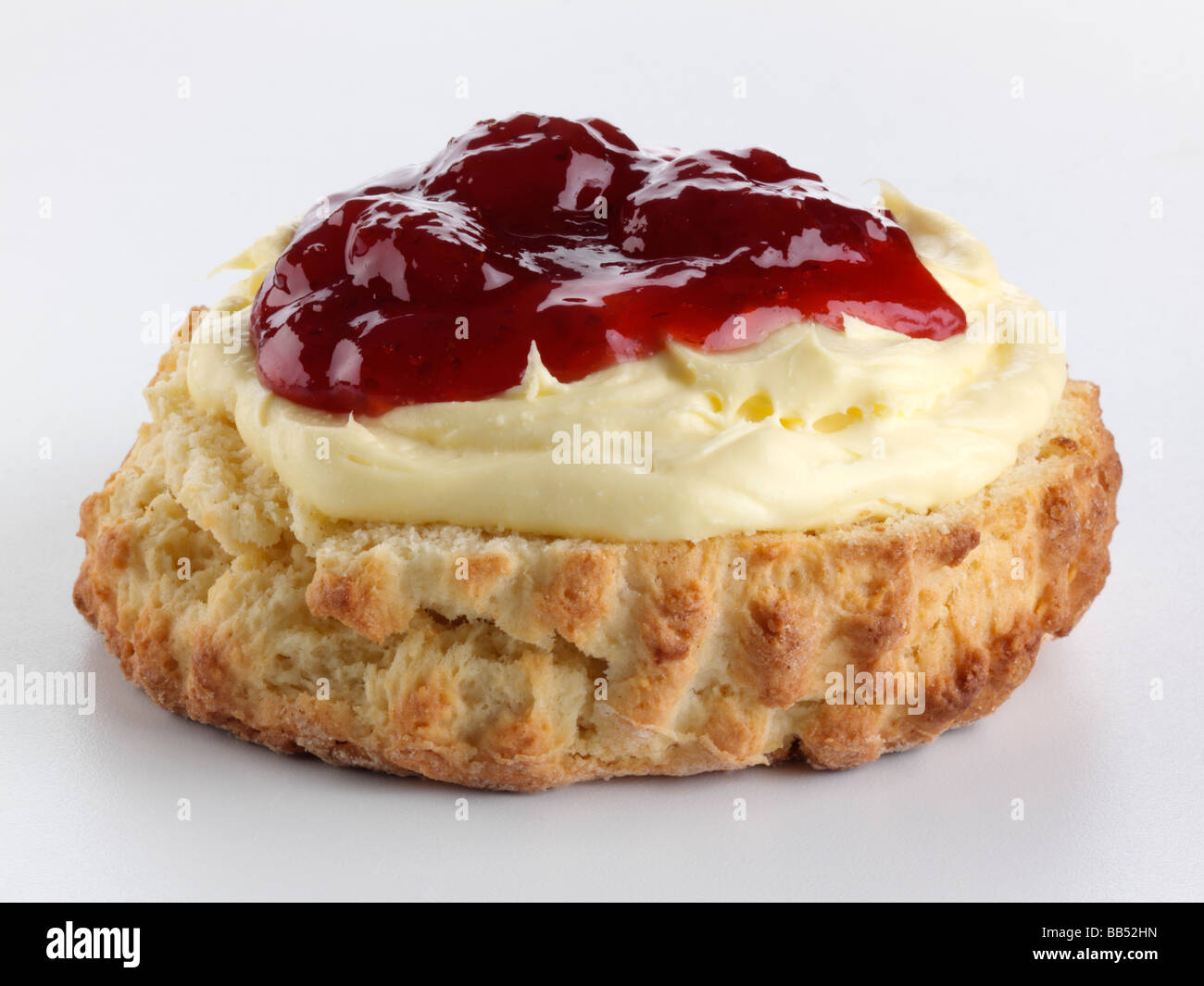Scone with jam and clotted cream Stock Photo - Alamy