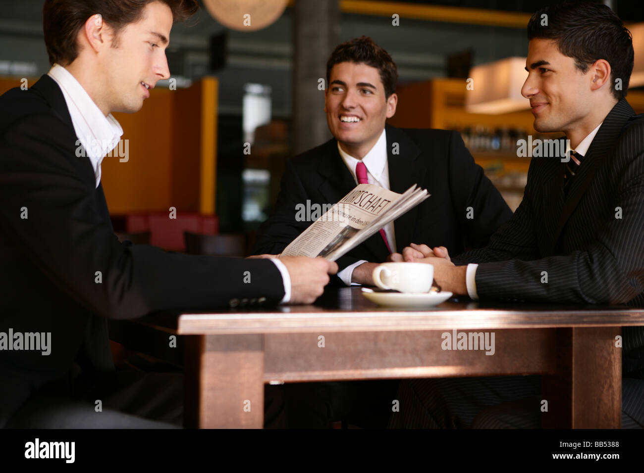 Business men in cafe Stock Photo - Alamy