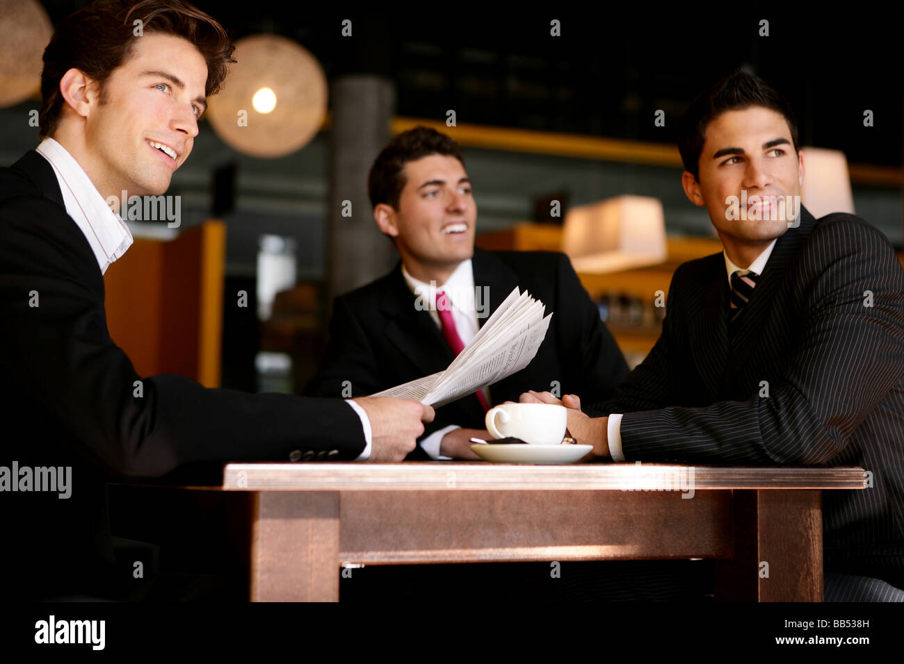 Business men in cafe Stock Photo - Alamy