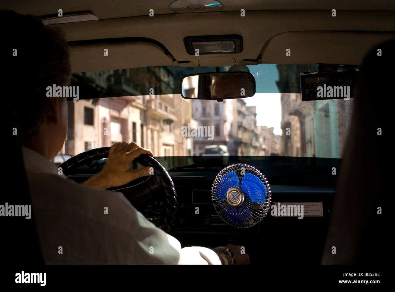 Taxi cab interior view from the backseat driving through Havana, Cuba ...