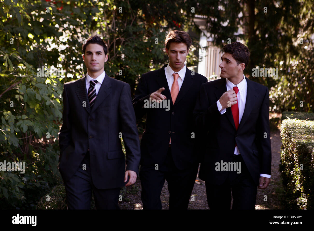 three business men in a park Stock Photo - Alamy