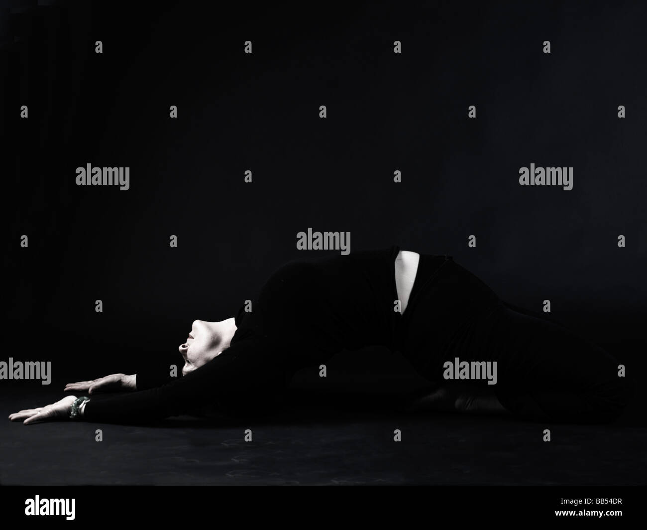 Matsyasana (Fish Pose) yoga with arms stretched Stock Photo - Alamy