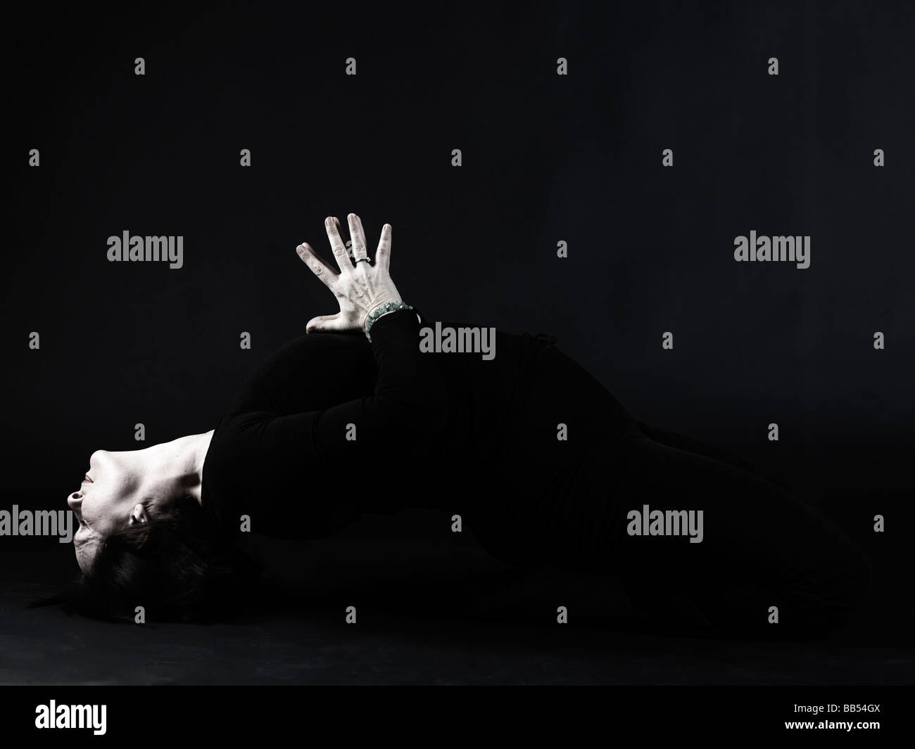 Matsyasana (Fish Pose) hands in prayer position Stock Photo - Alamy