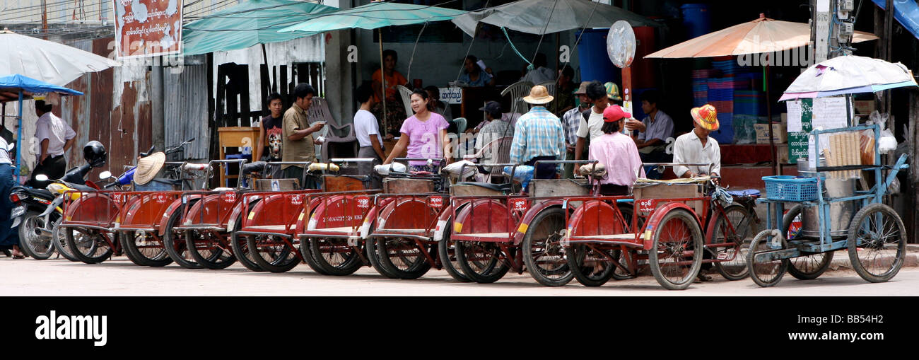 line of Myanmar tricycle Stock Photo - Alamy